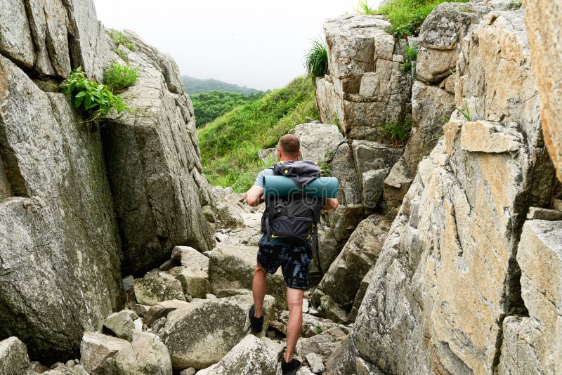 Back View Hiker Man with Backpack Going at Hilly Terrain Natural ...