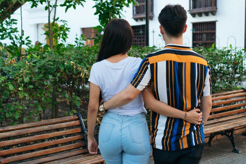 Back View of Hugging Couple Walking on Street Stock Photo - Image of ...