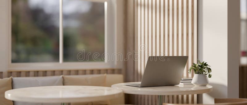 A Back View Image of a Laptop Computer on a Table in a Modern ...