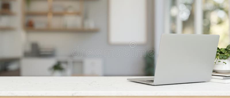 A Back View Image of a Laptop Computer on a White Tabletop in a ...