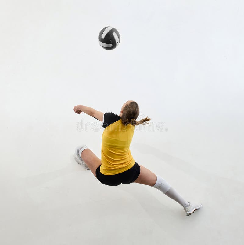 Back View Image of Young E Woman, Volleyball Player in Uniform Hitting ...