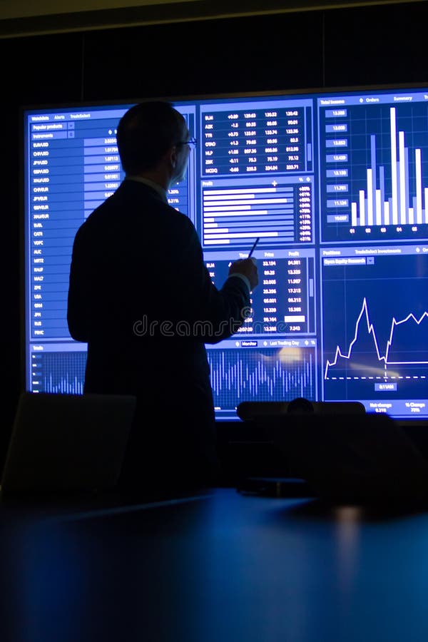 Back View of Investor Using Charts and Diagrams Stock Image - Image of ...