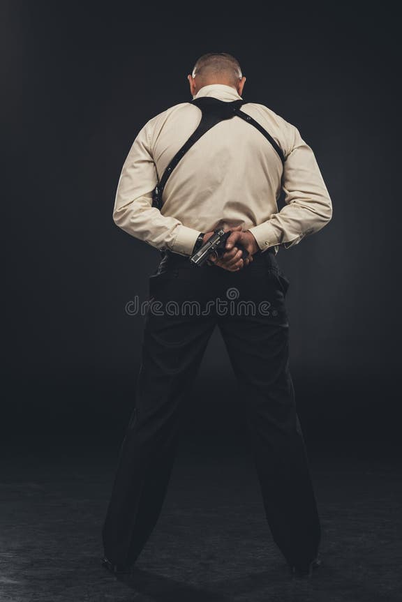 Back View of Killer in Shirt Holding Gun Stock Photo - Image of pistol ...
