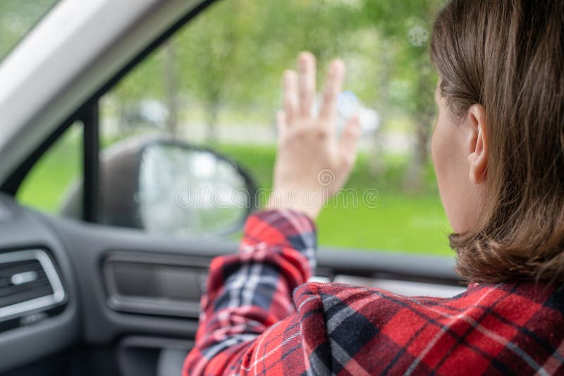 Back View of Lonely Girl Touching by Hand Rainy Window with Drop of Car ...