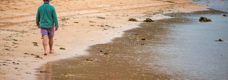 Back View of a Lonely Man Walking Along the Back. Loneliness and Relax ...