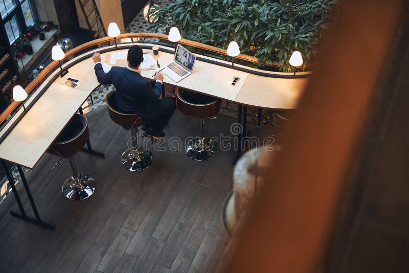 Man Looking at the Documents on the Table Stock Photo - Image of ...