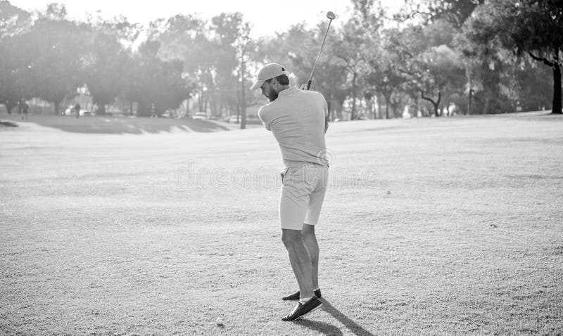 Back View of Male Golf Player on Professional Course with Green Grass ...