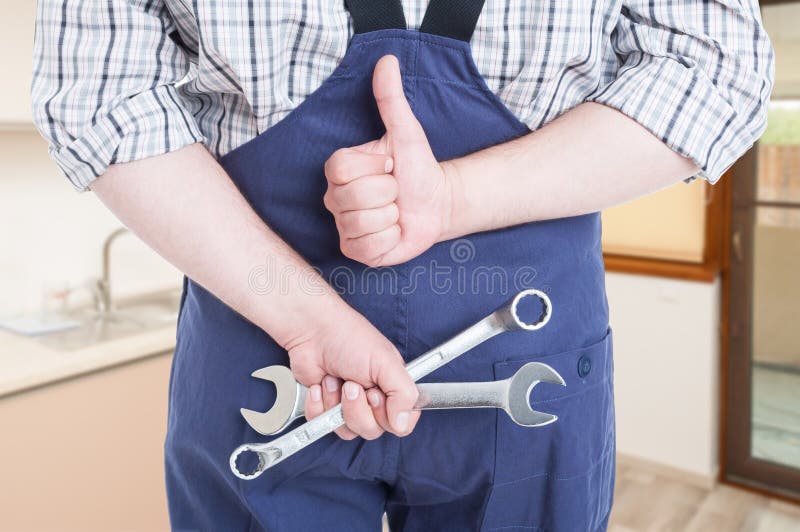 Back View of Male Plumber with Spanner Stock Photo - Image of positive ...