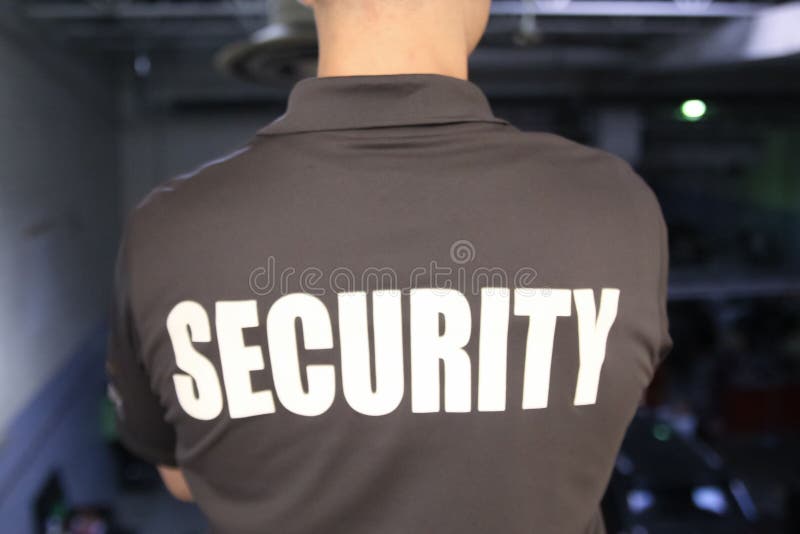 Back View of a Male Wearing a Black SECURITY Shirt Stock Image - Image ...