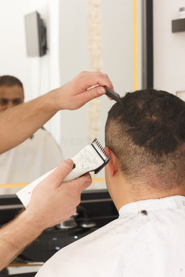 Back View of Man Getting Short Hair Trimming at Barber Shop with ...