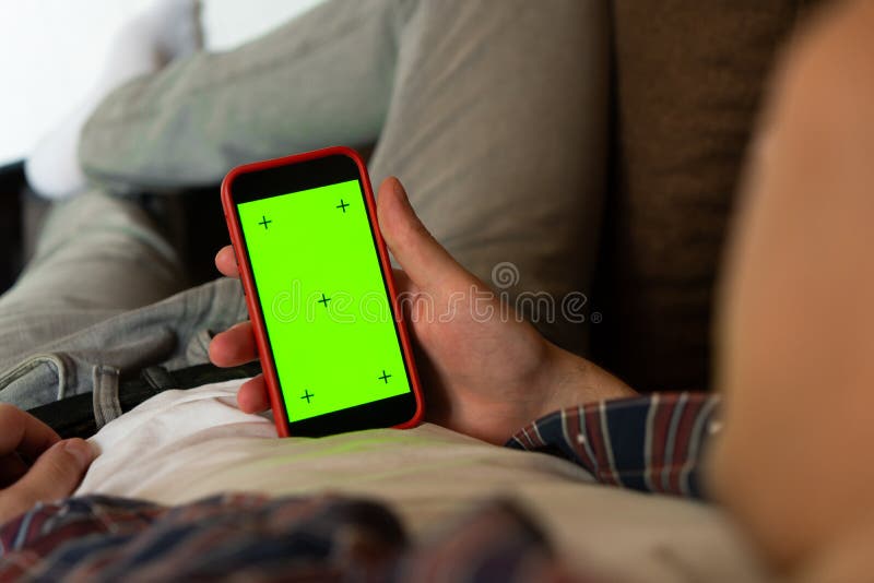 Back View of Man of Green Mock-up Screen Smartphone. Chroma Key with ...