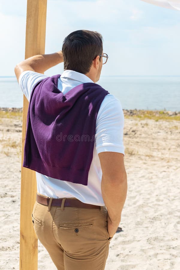 Back View of Man Looking Away Stock Image - Image of stand, clothes ...