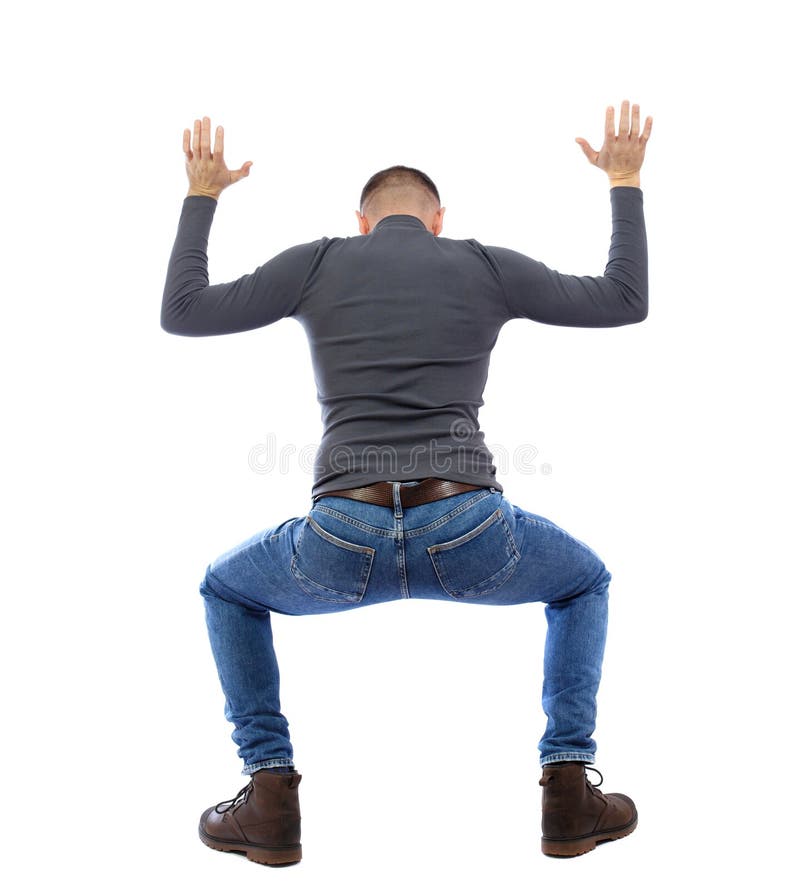 Back View. Man Protects Hands from What is Falling from Above Stock ...