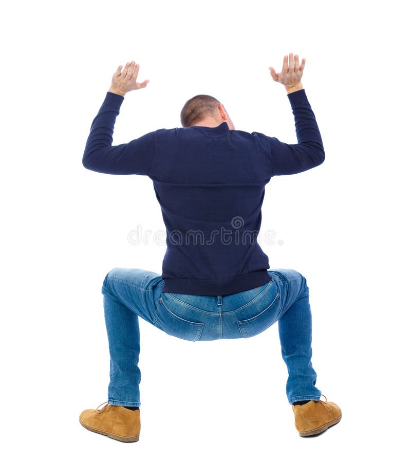 Back View. Man Protects Hands from What is Falling Above. Stock Photo ...