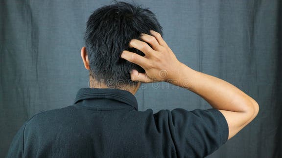 Back View of a Man Scratching His Head because it Itches. Dandruff ...