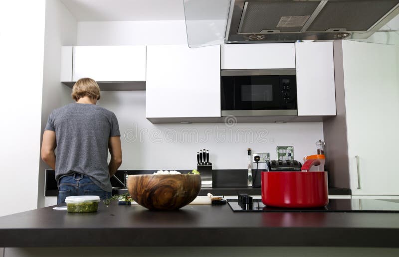 Back View of Man Standing in Kitchen Stock Image - Image of standing ...