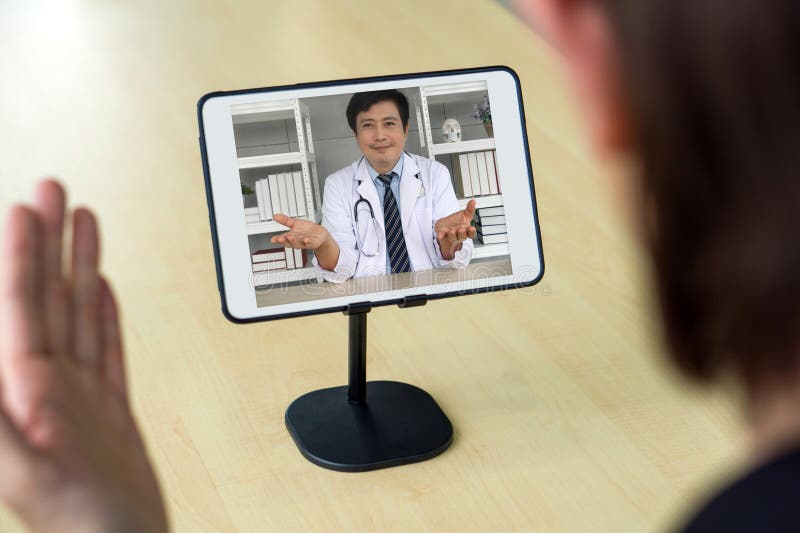 Back View of Man in Suit Have Webcam Conference on Tablet Computer with ...