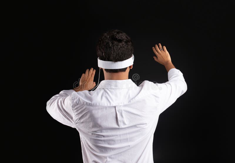 Back View of Man Touching Invisible Screen while Experiencing ...