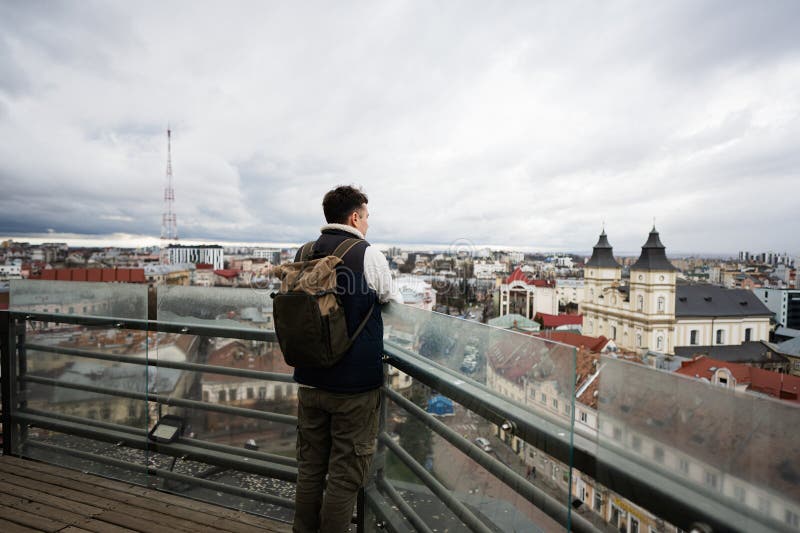 Back View of Man Tourist with Backpack Stand on Background of Panorama ...