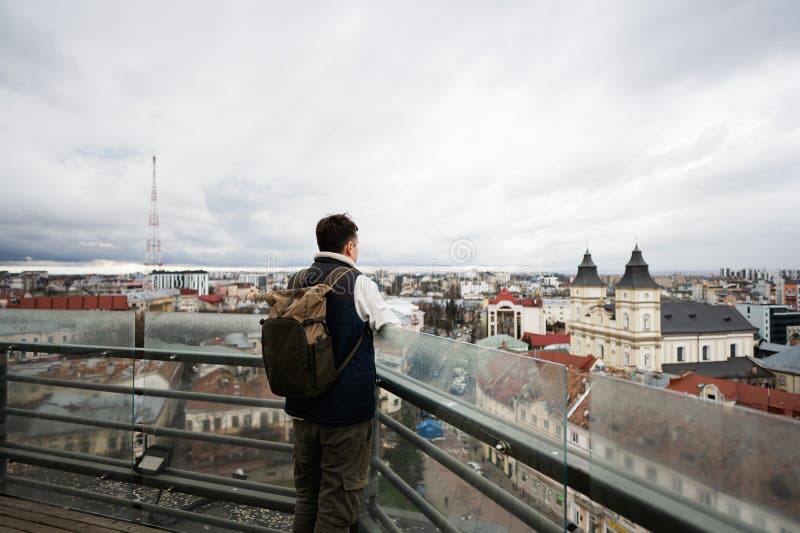 Back View of Man Tourist with Backpack Stand on Background of Panorama ...