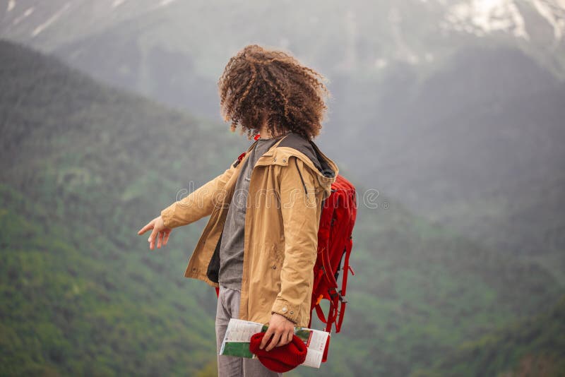 The Man Traveler with backpack hiking outdoor, Back view Man Traveler ...