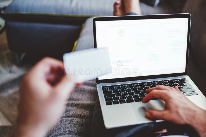 Cropped Image of Millennial Male Holding Credit Card and Hopping in Web ...