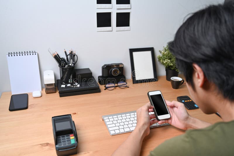 Man Using Smart Phone at His Workplace. Stock Photo - Image of ...