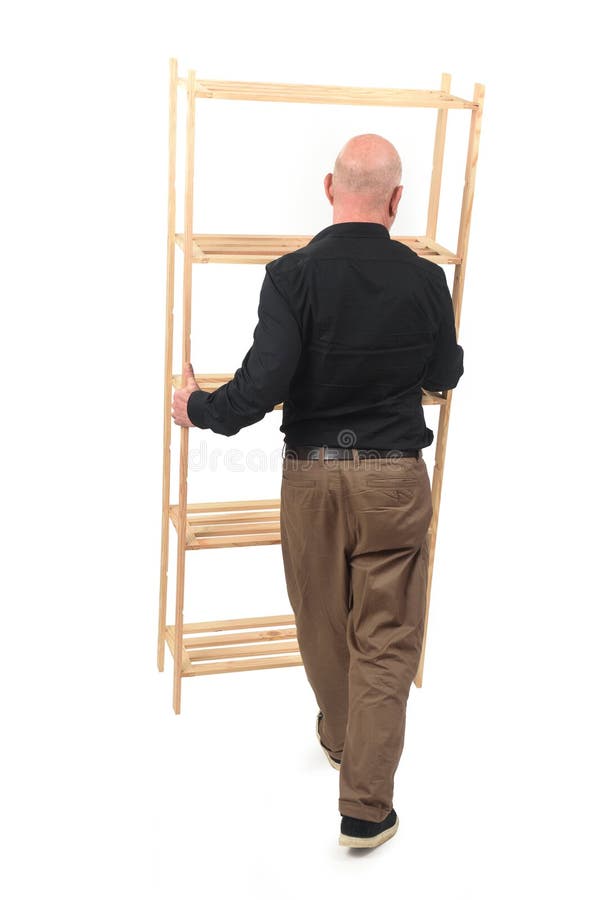 Two Men Carrying Shelf stock photo. Image of furniture - 222462788