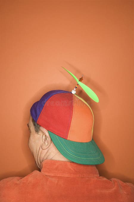 Back View of Man Wearing Propeller Cap. Stock Image - Image of color ...