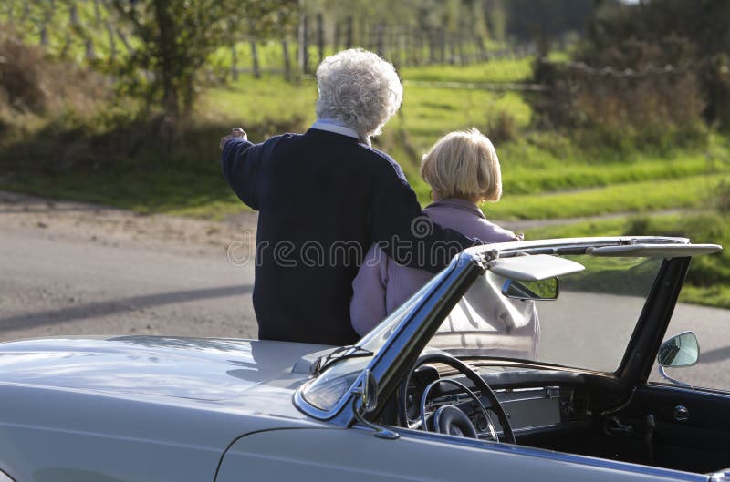 Back View of Mature Couple by Car in Countryside Stock Image - Image of ...
