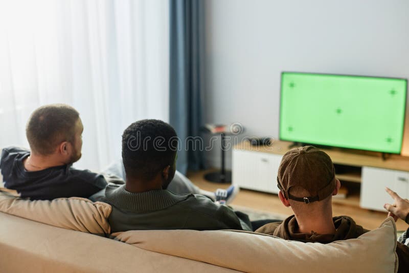 Back View Men Watching TV with Green Screen Sitting on Sofa Stock Image ...