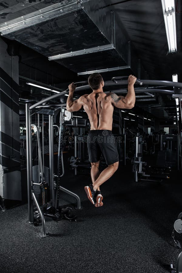 Strong man doing pull ups stock image. Image of body - 121412927 Strong man doing pull ups stock image. Image of body - 121412927