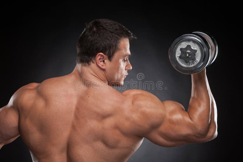 Strong and Power Bodybuilder Doing Exercises with Dumbbell Stock Photo ...
