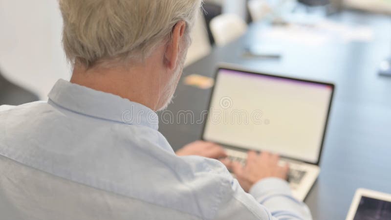 Back View of Old Man Typing on Laptop Stock Photo - Image of typing ...