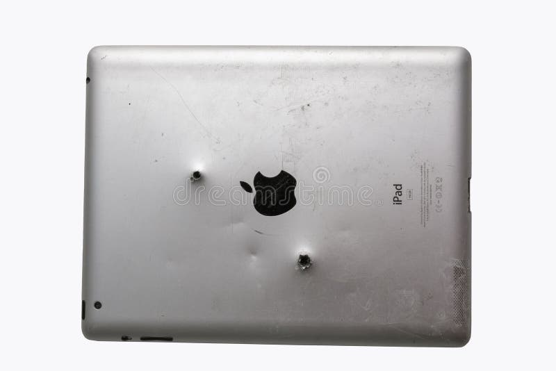 Back View of Old Silver Ipad with Bullet Holes. Russia, 22.03.2020 ...