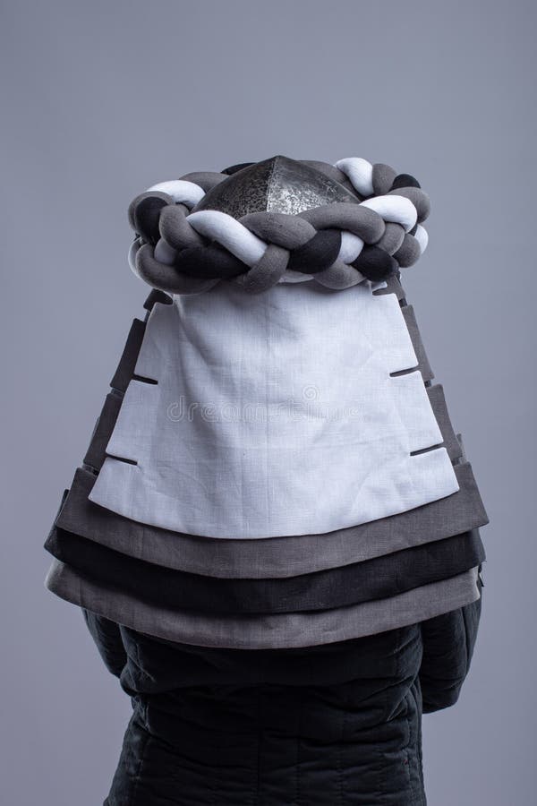 Back View of a Person in Medieval Knight Helmet and Layered Garment ...