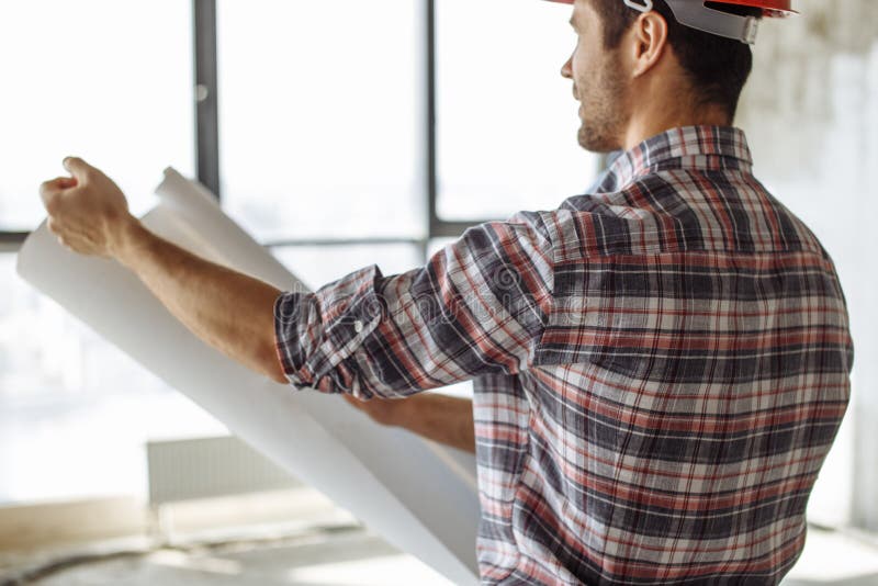 Back View Photo. Pensive Constructor is Thinking about New Project ...