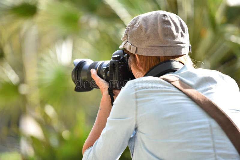 Back View of Photographer with Reflex Camera Stock Image - Image of ...