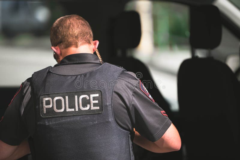 Back View of Police Officer Wearing Uniform Stock Photo - Image of ...
