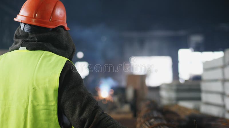 Back View Portrait of a Worker in the Hardhat Stock Video - Video of ...