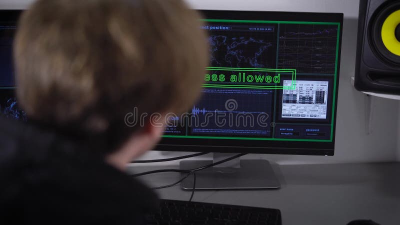 Back View of Professinal Hacker Making Cyber Attack on Network of the ...