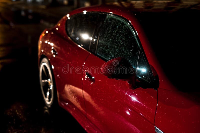 Back View of Red Modern Sport Car, after Rain in Night City. Stock ...