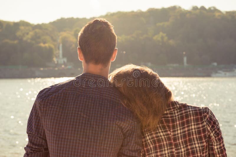 Back View of Romantic Couple in Love Watching at the River Stock Image ...