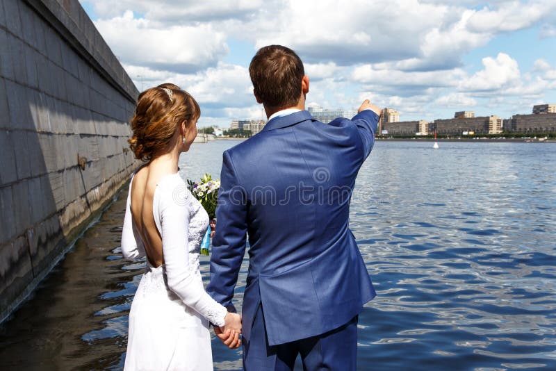 Back View of a Romantic Couple by the River in Summer Stock Image ...