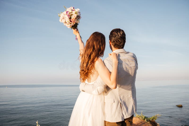 Back View of a Romantic Happy Married Couple Standing Stock Photo ...