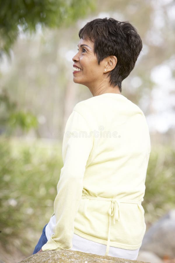 Active Senior Woman Walking in a Wood Stock Photo - Image of looking ...