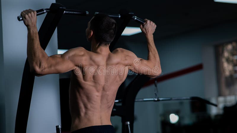 Back View of Shirtless Man with Pull-ups in Gym. Stock Photo - Image of ...