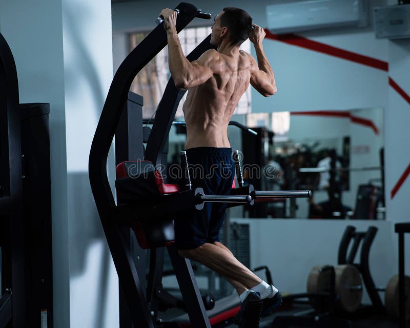 Back View of Shirtless Man with Pull-ups in Gym. Stock Image - Image of ...