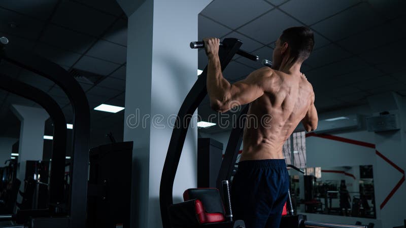 Back View of Shirtless Man with Pull-ups in Gym. Stock Photo - Image of ...