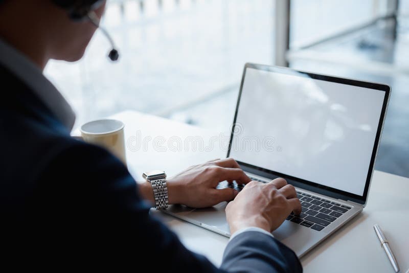 Back View Shot of Call Center Agent in Headset Consulting Client and ...